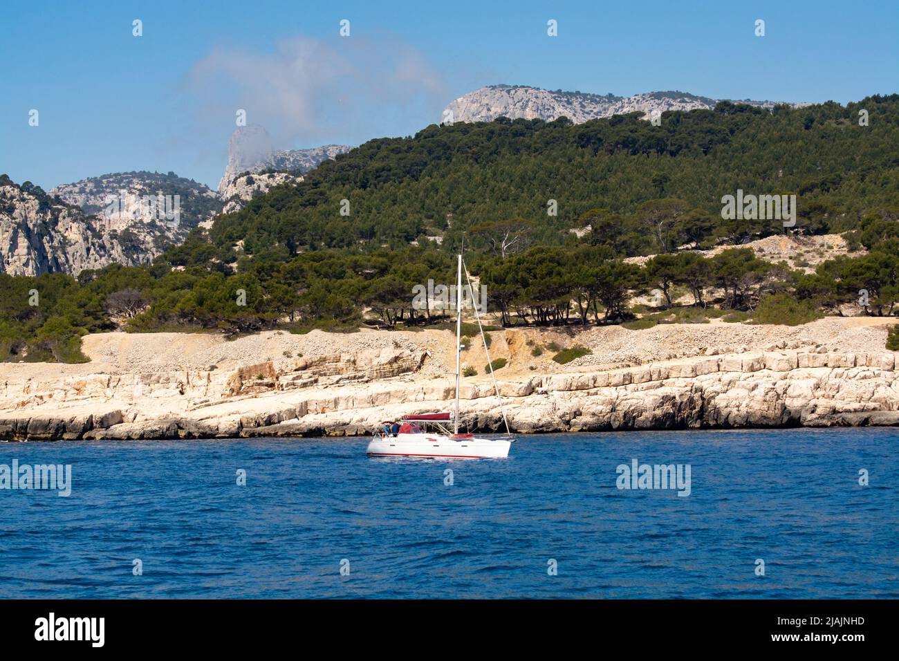 Limestone cliffs and blue sea near Cassis, boat excursion to Calanques ...