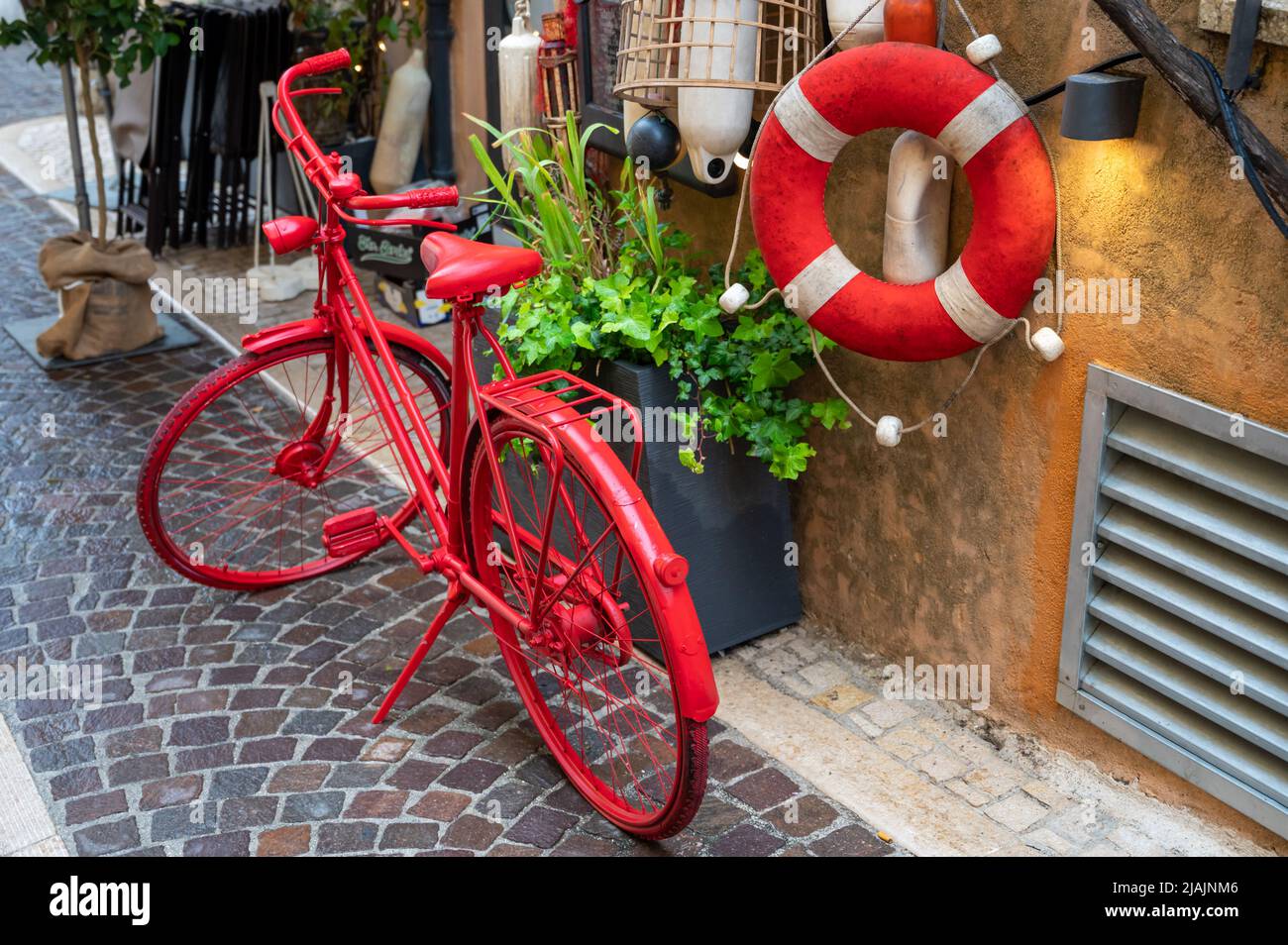 Rainy day in April in South of France, narrow streets and colorful ...