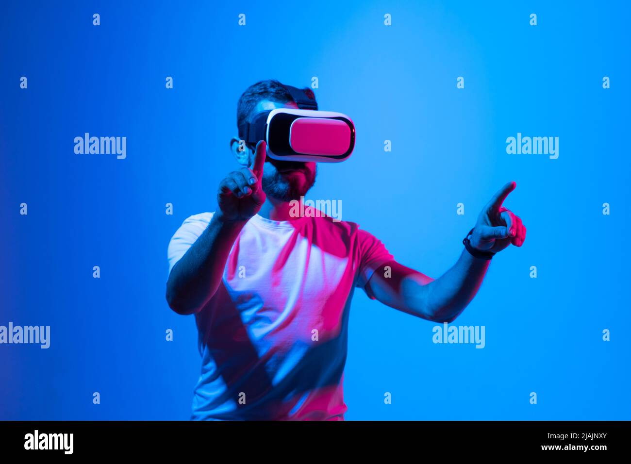 Vitrual reality concept. Man are playing a game in virtual reality ...