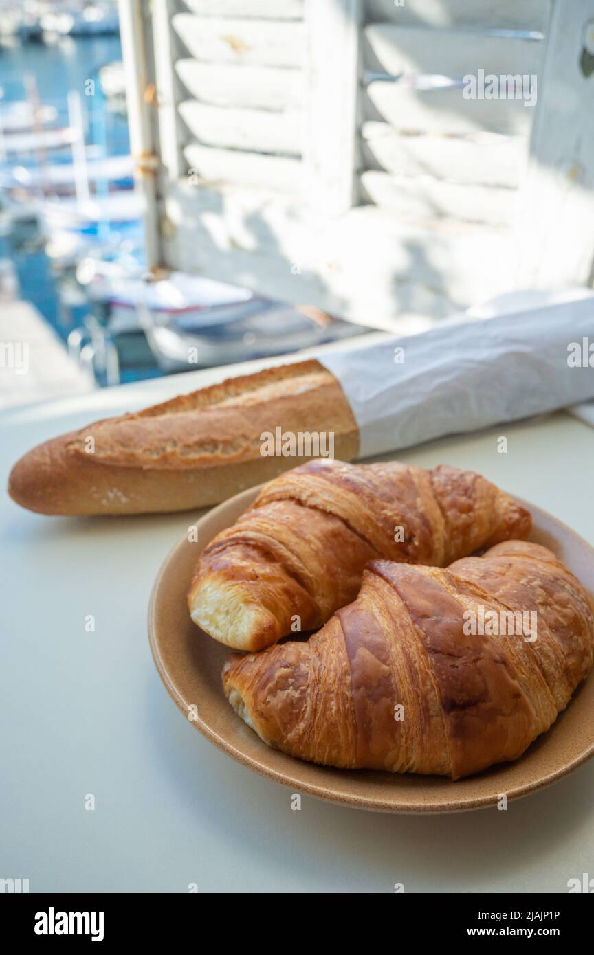 Summer morning in Provence, traditional breakfast with fresh baked ...