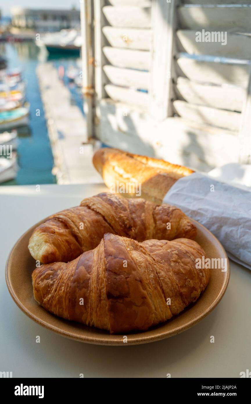 Summer morning in Provence, traditional breakfast with fresh baked ...