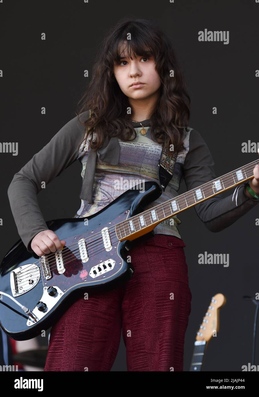 Singer and bass guitarist Penelope Lowenstein is shown performing on ...