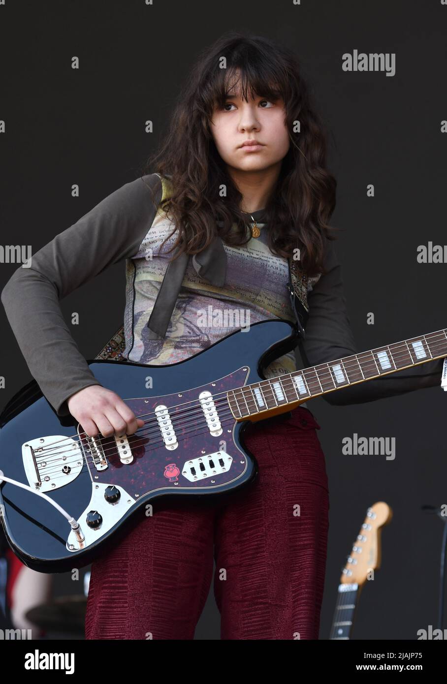 Singer and bass guitarist Penelope Lowenstein is shown performing on ...