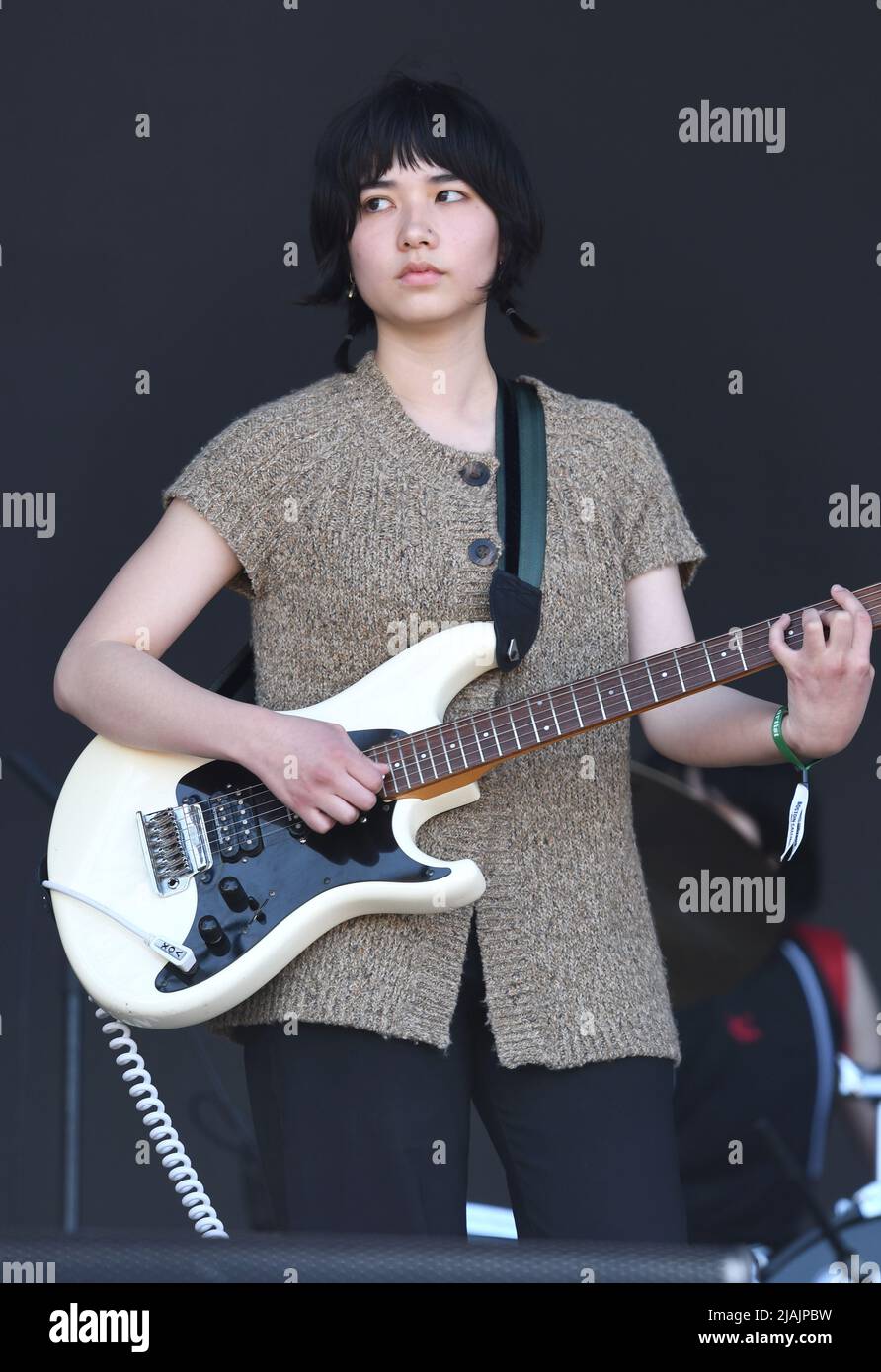 Singer, songwriter and guitarist Nora Cheng is shown performing on ...