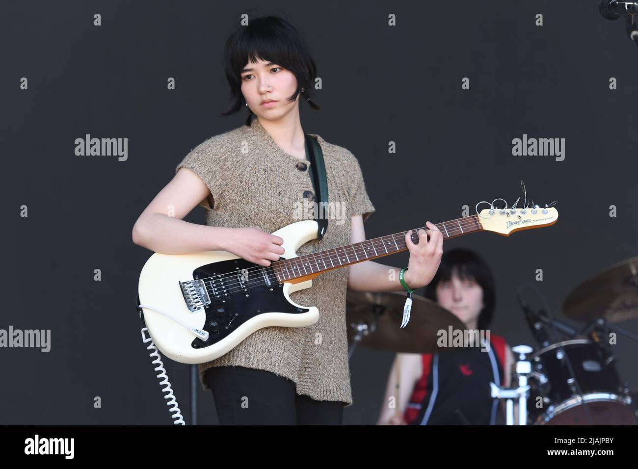 Singer, songwriter and guitarist Nora Cheng is shown performing on ...
