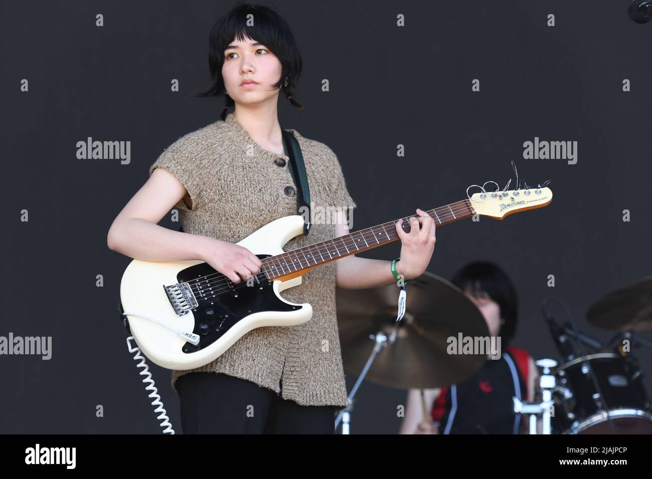 Singer, songwriter and guitarist Nora Cheng is shown performing on ...