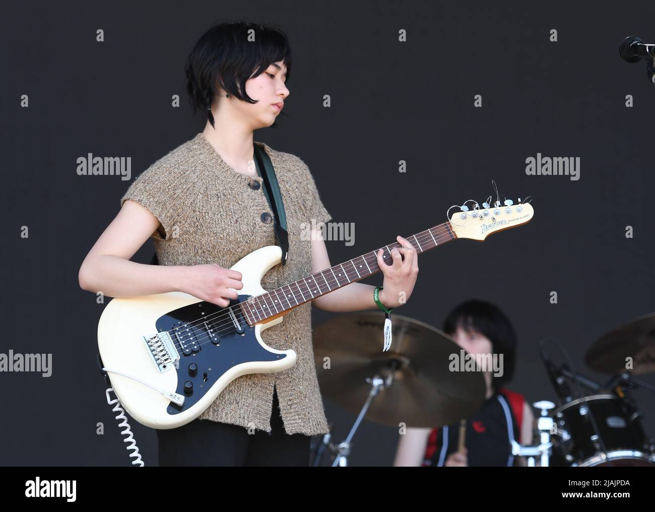 Singer, songwriter and guitarist Nora Cheng is shown performing on ...