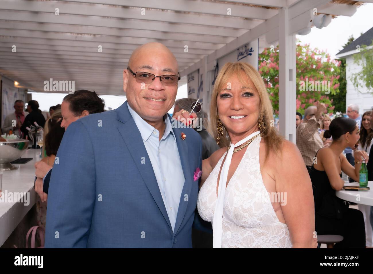 Lionel Chitty and Demetra Mattone attend Dan's Papers VIP Summer ...