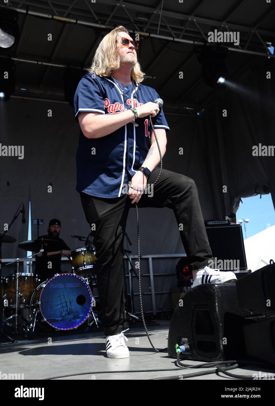 Singer Michael Medlock is shown performing on stage during a live ...