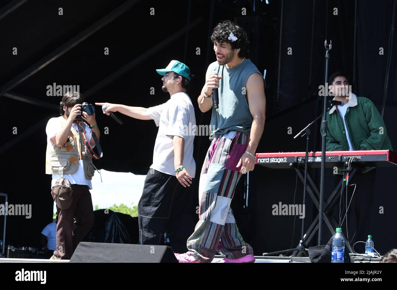 The Peach Tree Rascals are shown performing on stage during a live ...