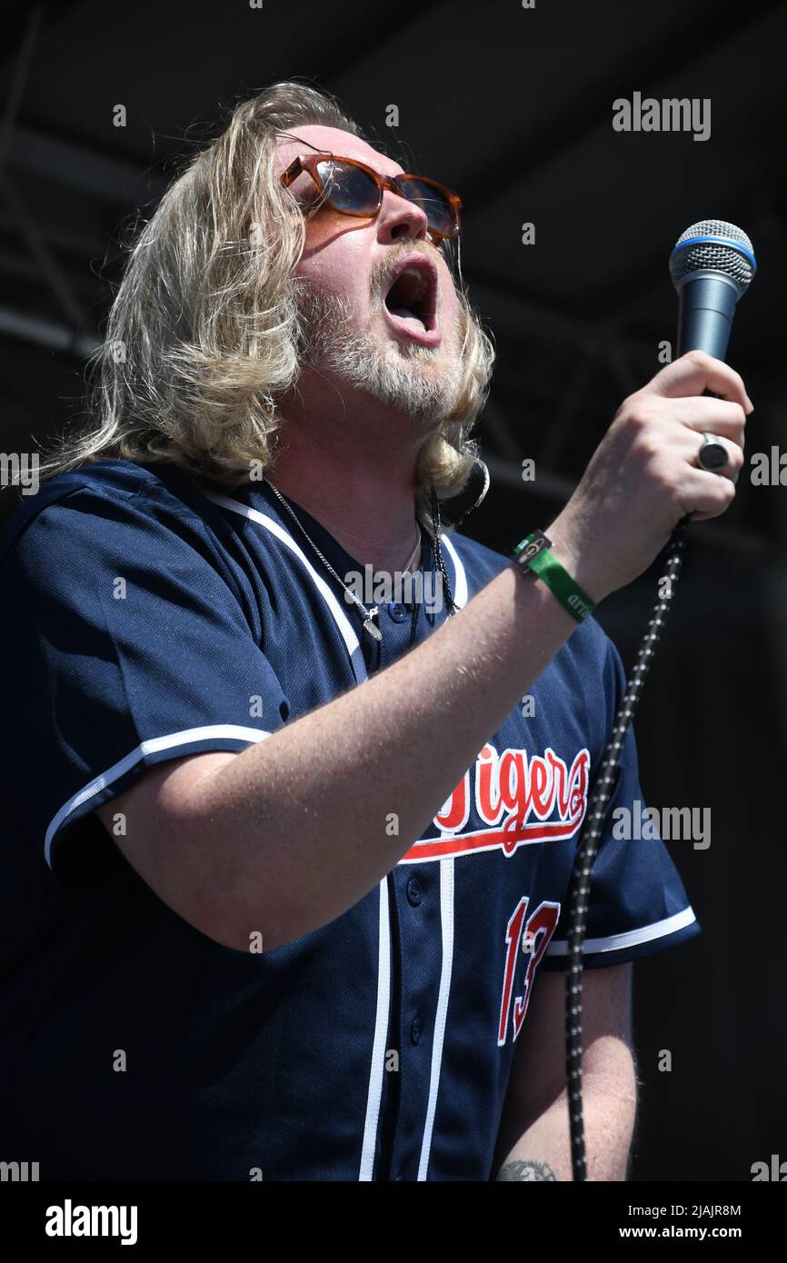 Singer Michael Medlock is shown performing on stage during a live ...