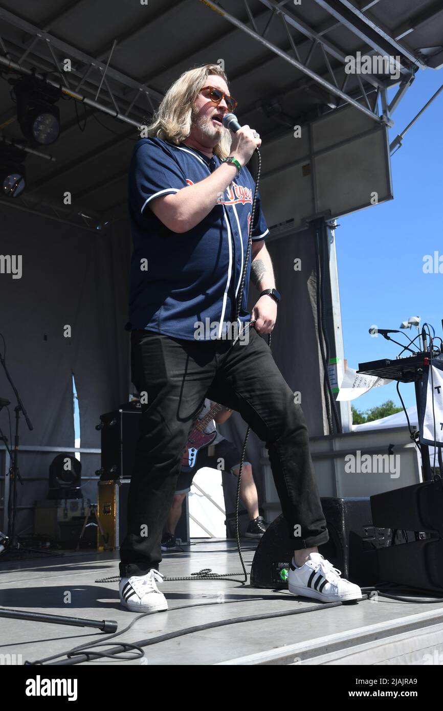 Singer Michael Medlock is shown performing on stage during a live ...