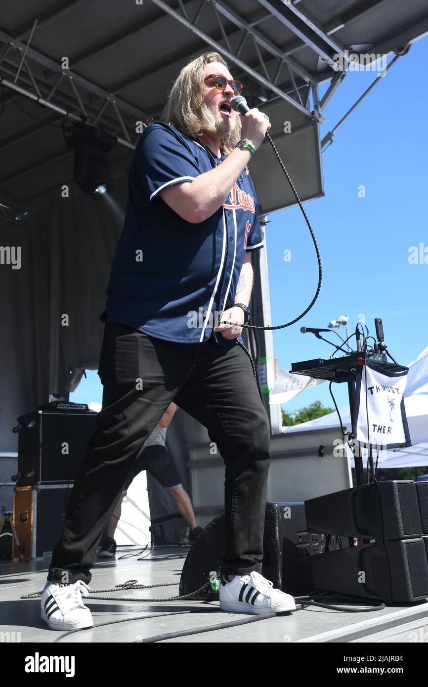 Singer Michael Medlock is shown performing on stage during a live ...
