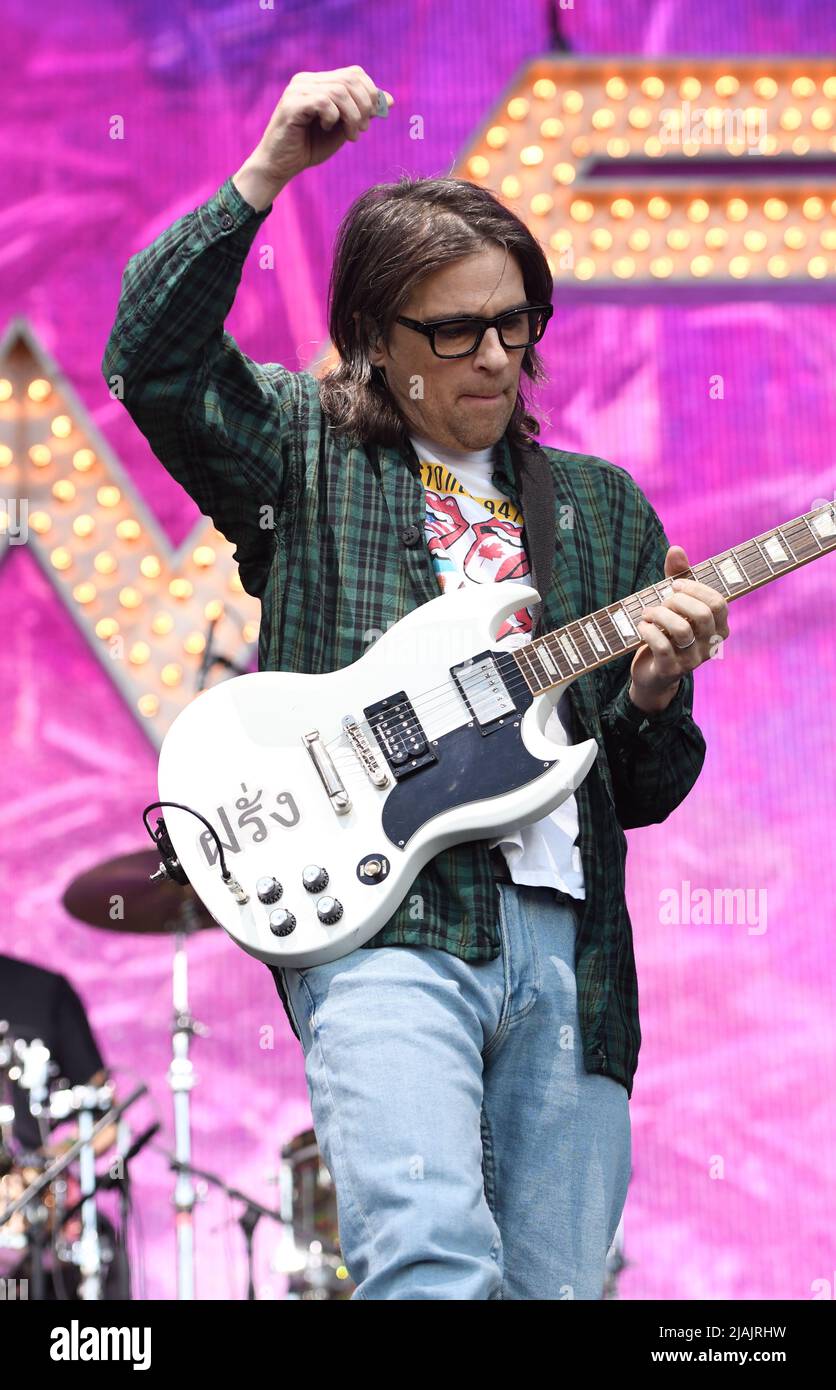 Singer, songwriter and guitarist Rivers Cuomo is shown performing on ...