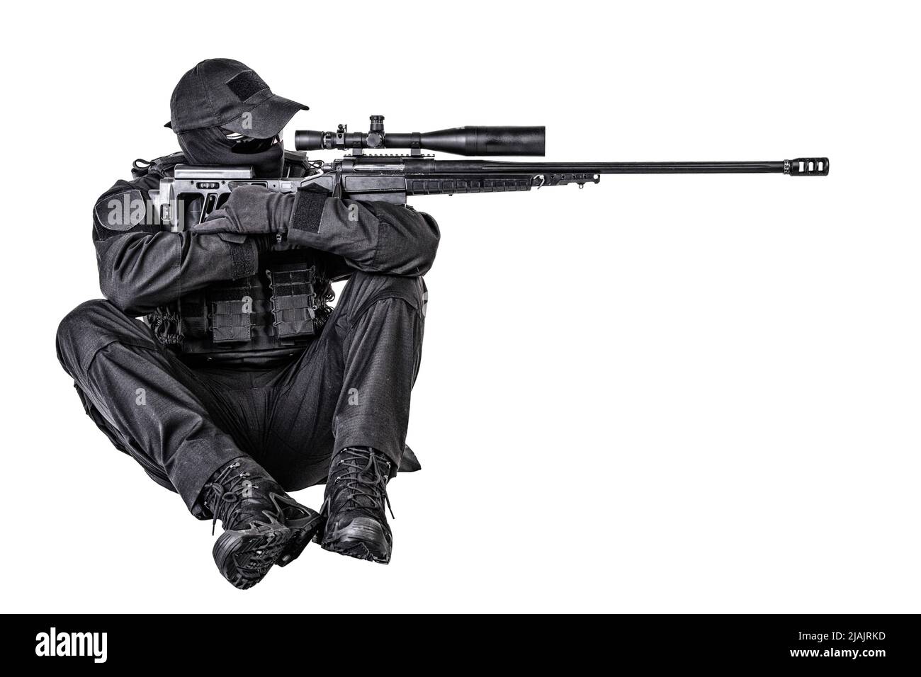 SWAT team sniper sitting and aiming with sniper rifle equipped ...
