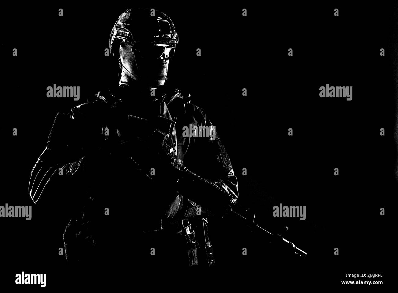 Counter-terrorism forces soldier in black uniform and helmet, aiming ...