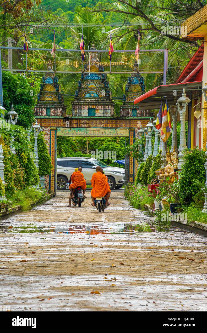 An Giang Province, Vietnam - May 01, 2022 : Khmer monks riding scooter on rural road in Mekong ...