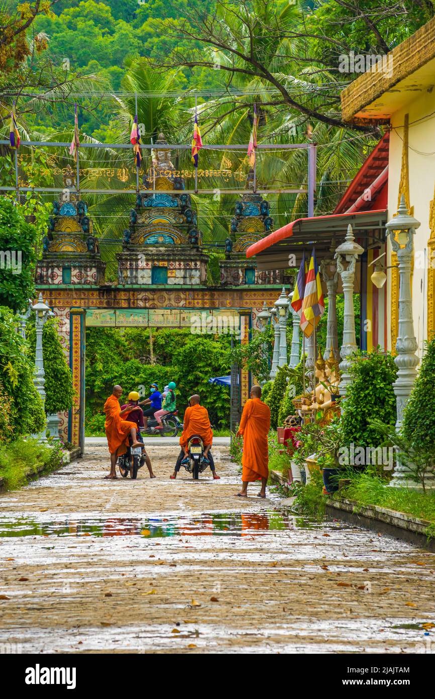 An Giang Province, Vietnam - May 01, 2022 : Khmer monks riding scooter on rural road in Mekong ...