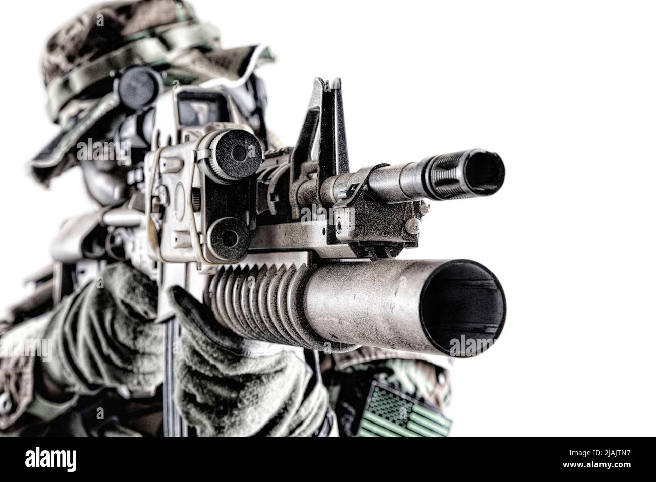 Commando soldier aiming service rifle equipped with grenade launcher ...