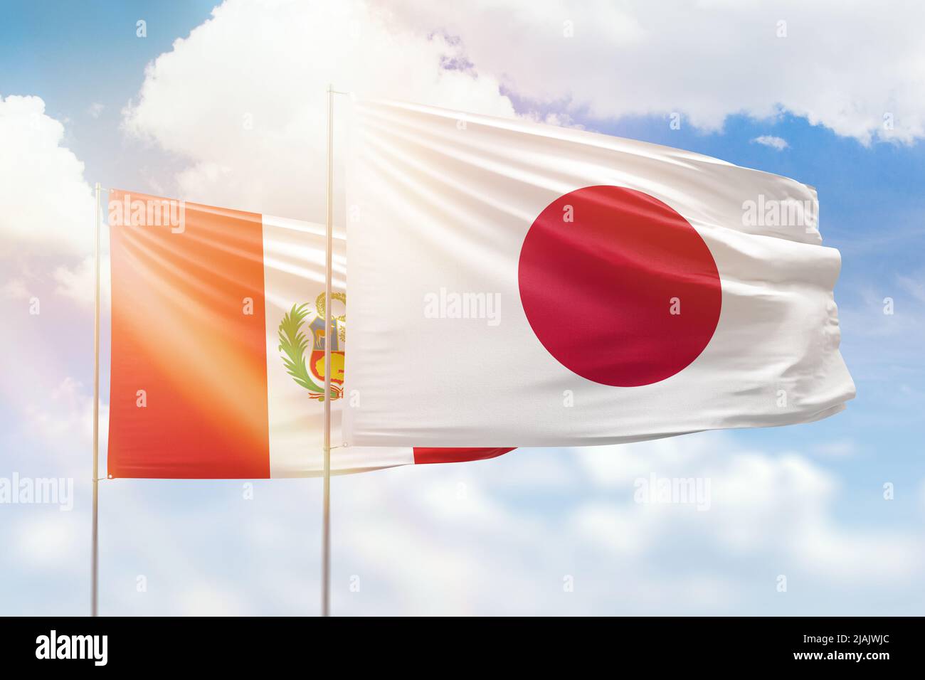 Sunny blue sky and flags of japan and peru Stock Photo - Alamy