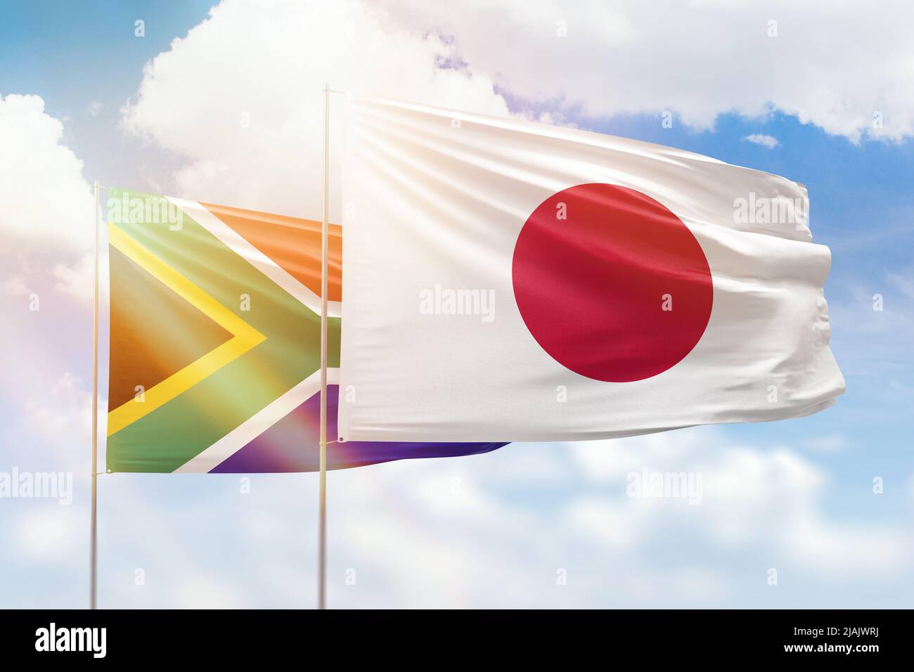 Sunny blue sky and flags of japan and south africa Stock Photo - Alamy