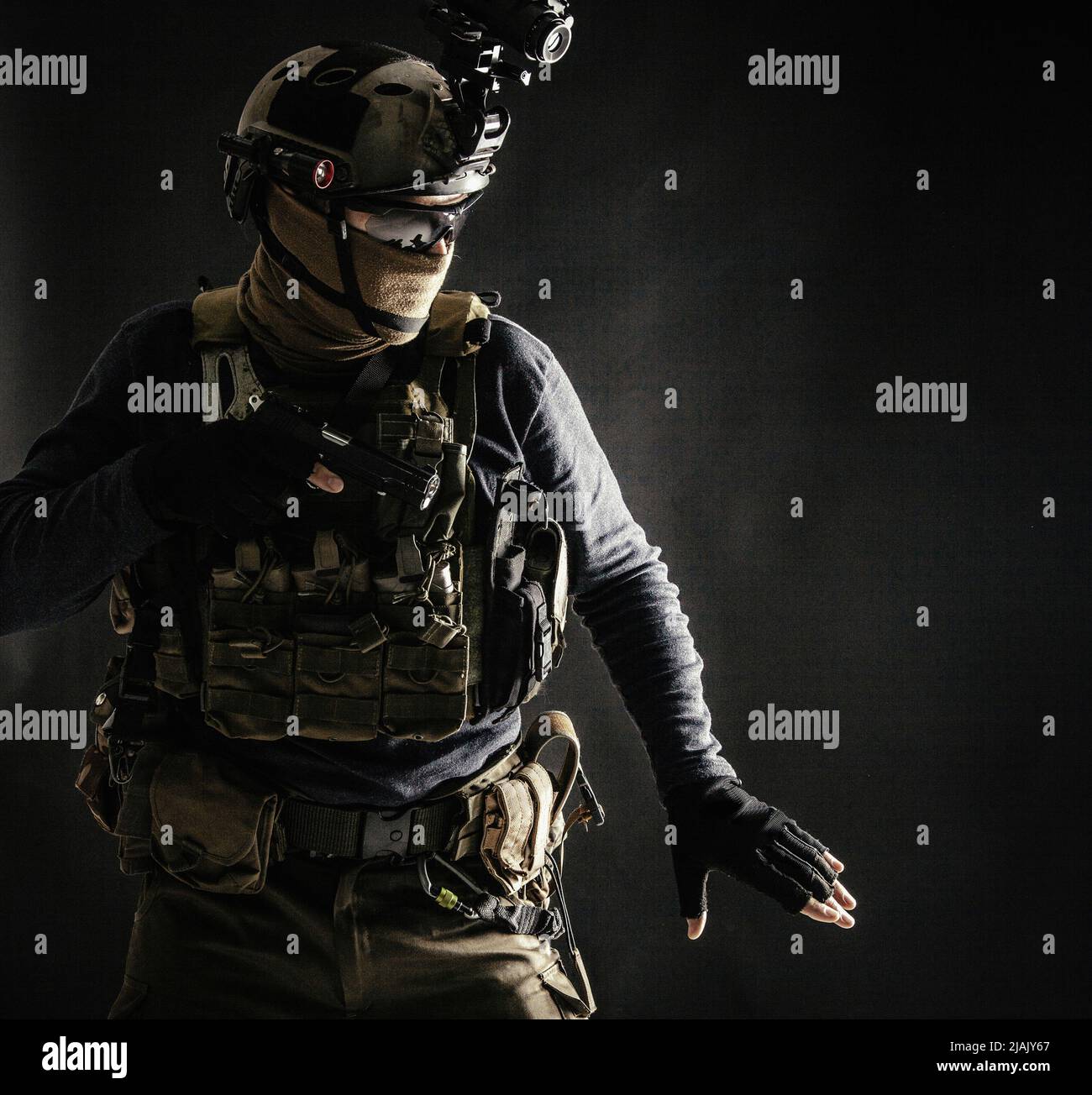 Special operations fighter wearing helmet with thermal imager ...