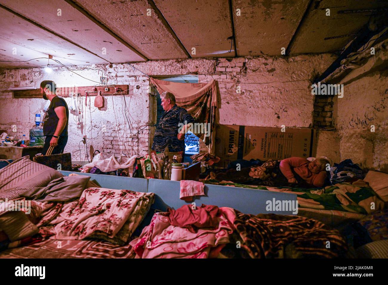 Soledar, Ukraine. 30th May, 2022. People seen in a bunker of Soledar ...