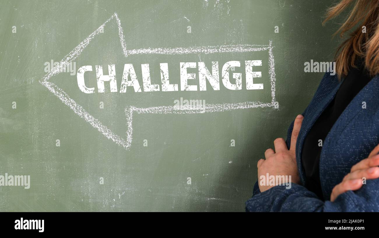 CHALLENGE. Arrow with text on a green chalk board Stock Photo - Alamy