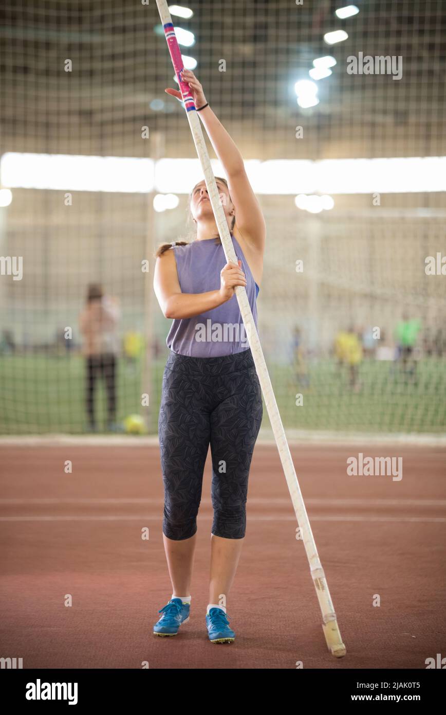 Athlete holding pole vault hi-res stock photography and images - Alamy