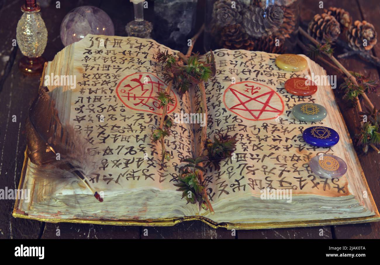 Wicca, esoteric and occult still life with vintage magic objects and ...