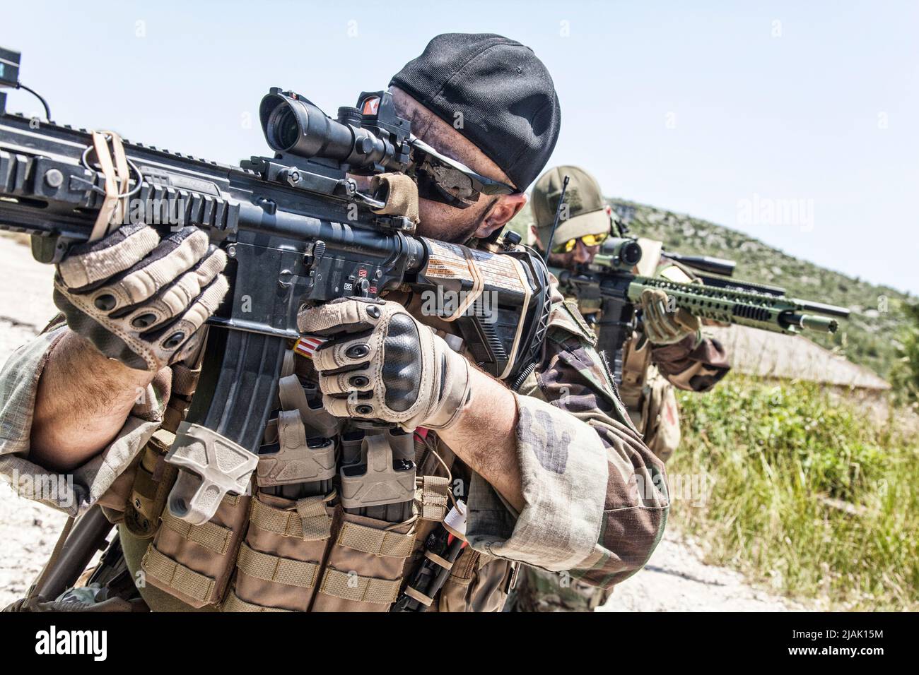 Two people gun head hi-res stock photography and images - Alamy