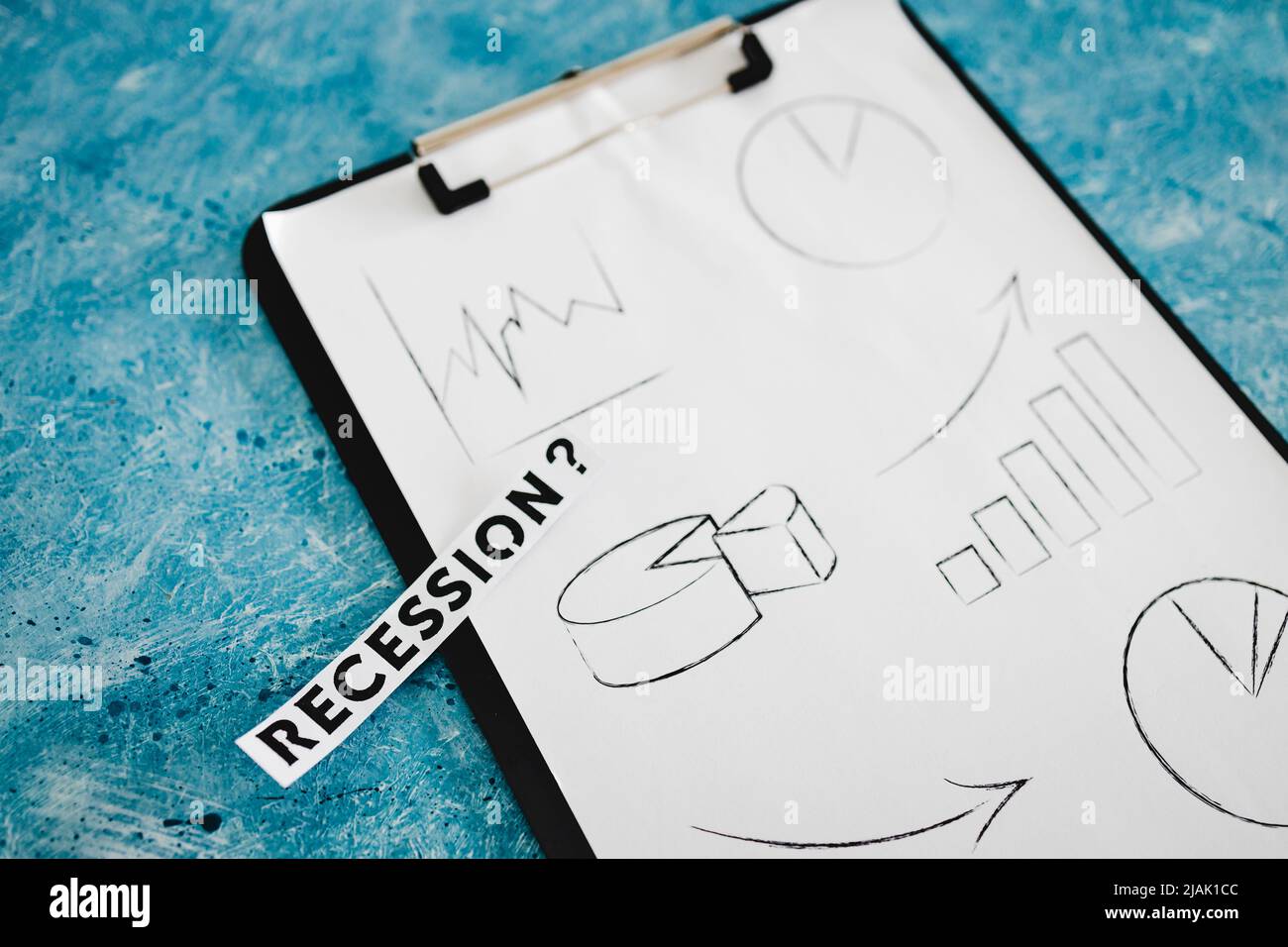 recession and stagnating economy conceptual image with text next to ...