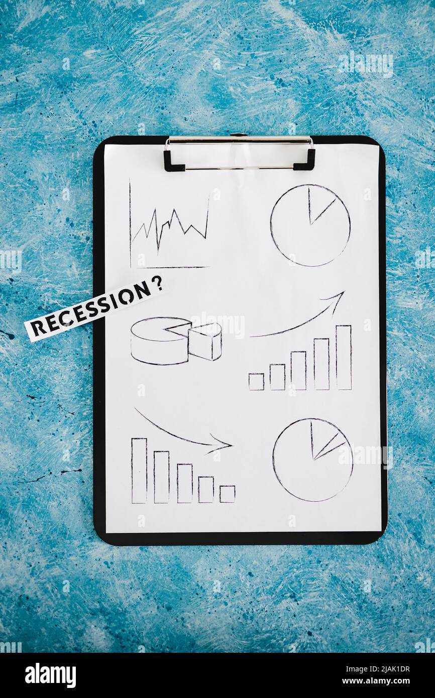 recession and stagnating economy conceptual image with text next to ...