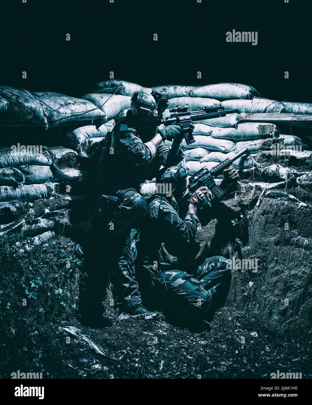 Aiming rifle army soldier holding sandbag hi-res stock photography and ...