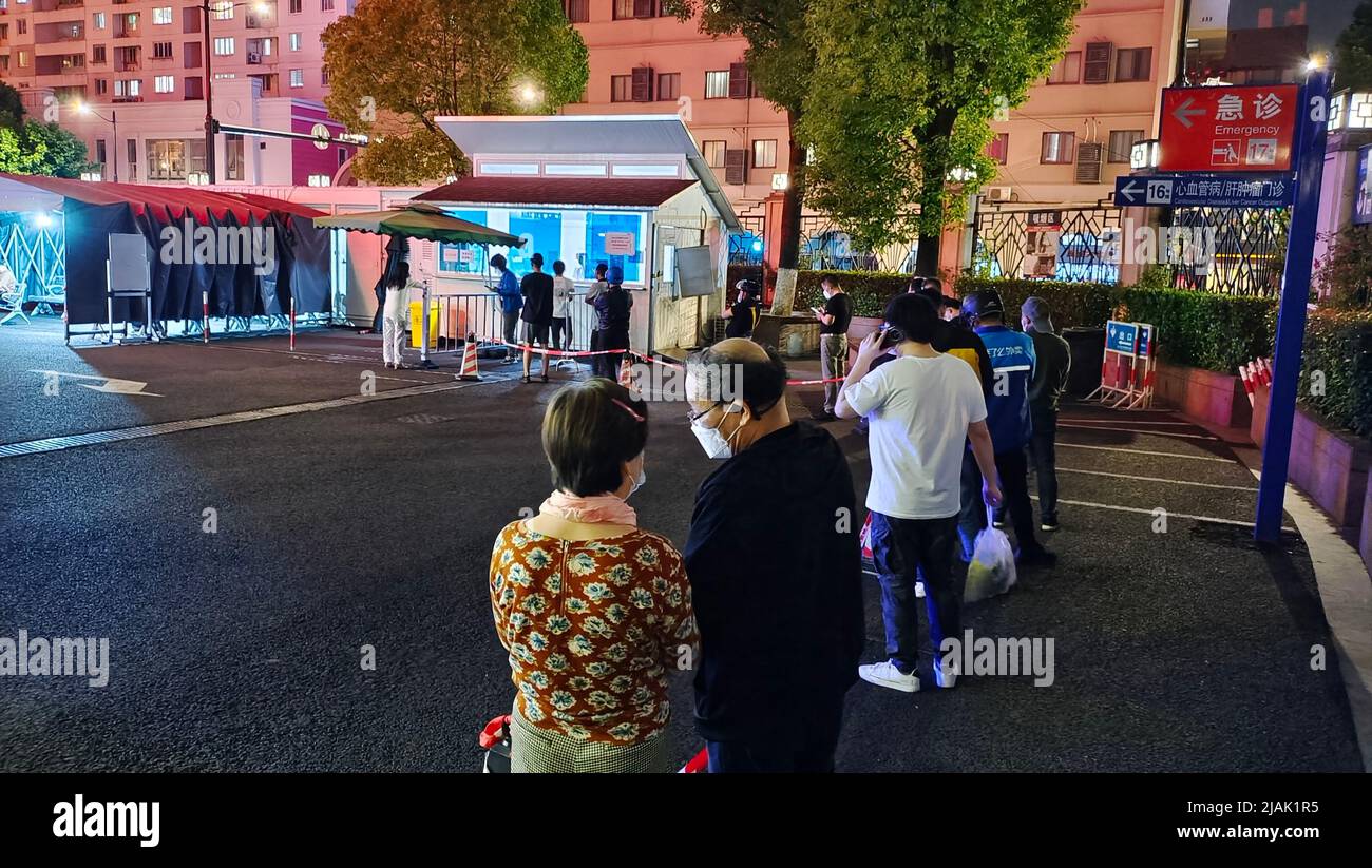 SHANGHAI, CHINA - MAY 30, 2022 - People queue up for nucleic acid tests ...