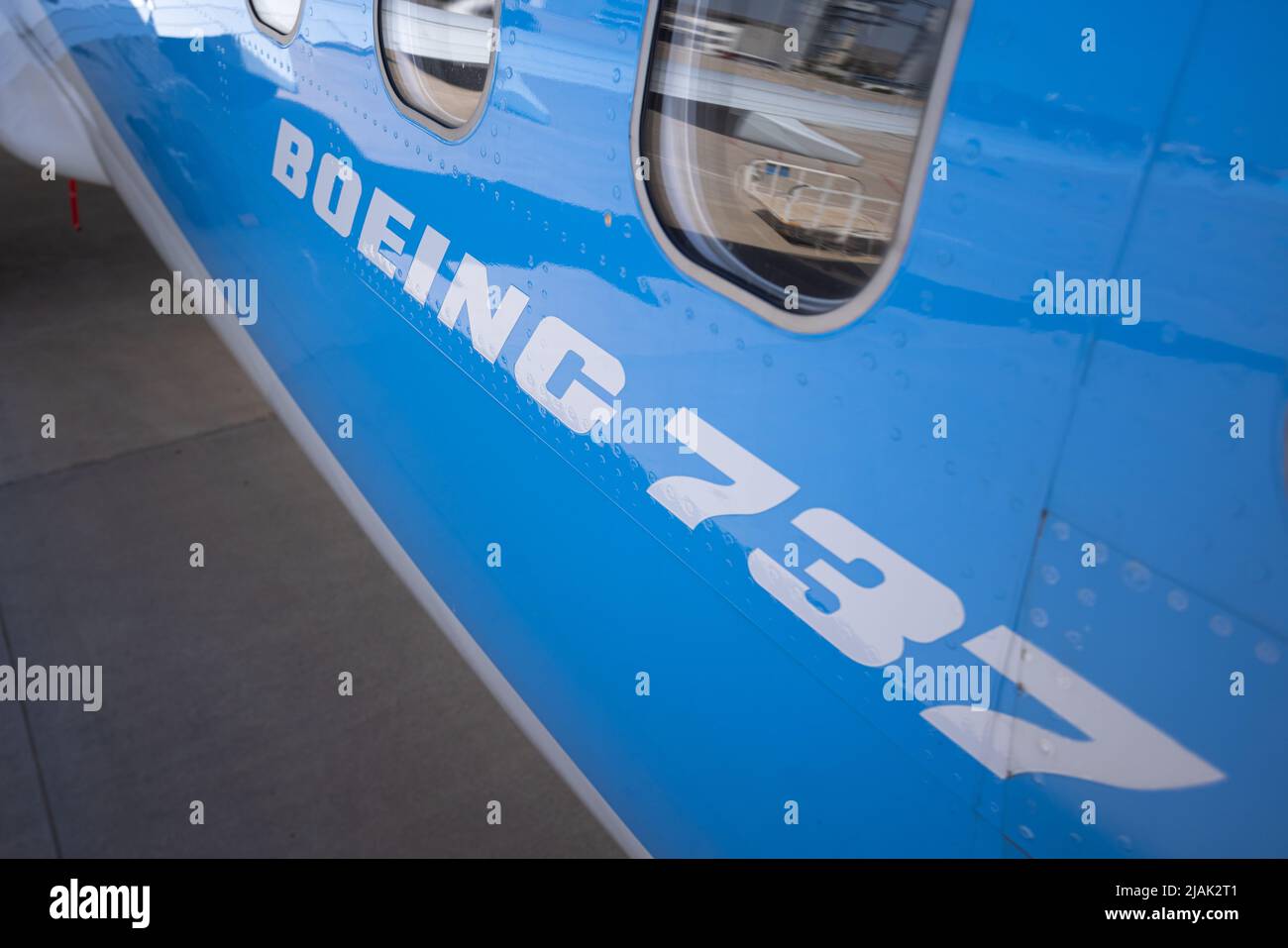 Boeing 737 signage under airplane windows on side of a boeing 737 max ...