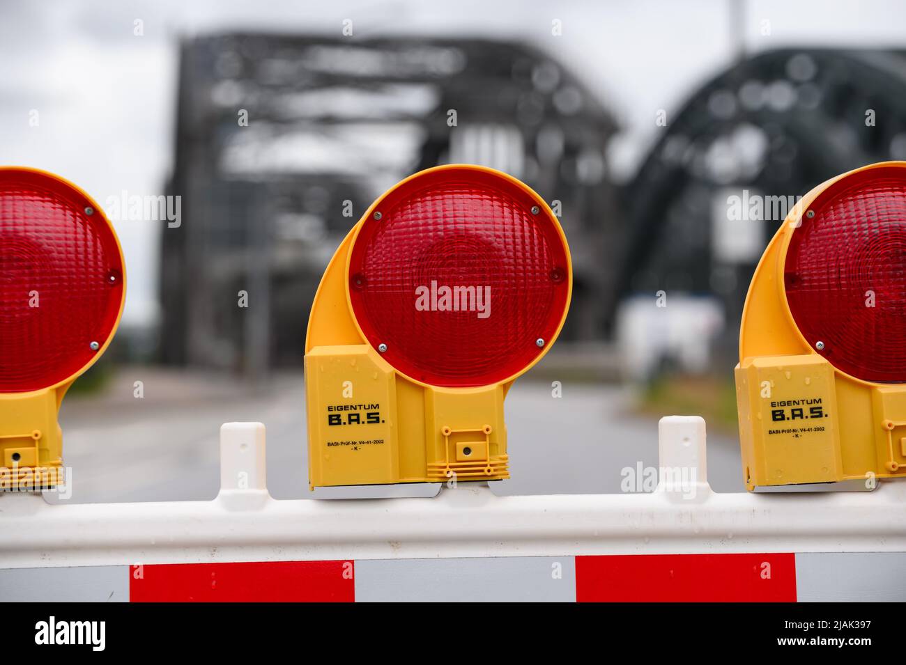 Hamburg, Germany. 29th May, 2022. Warning lights stand on a barrier ...