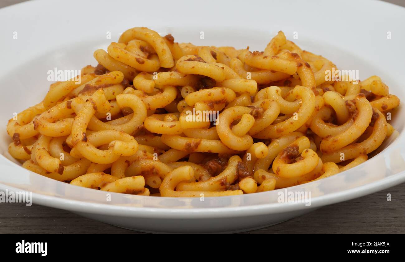 Italian Gramigna Pasta. Gramigna with bolognese ragù. Traditional ...