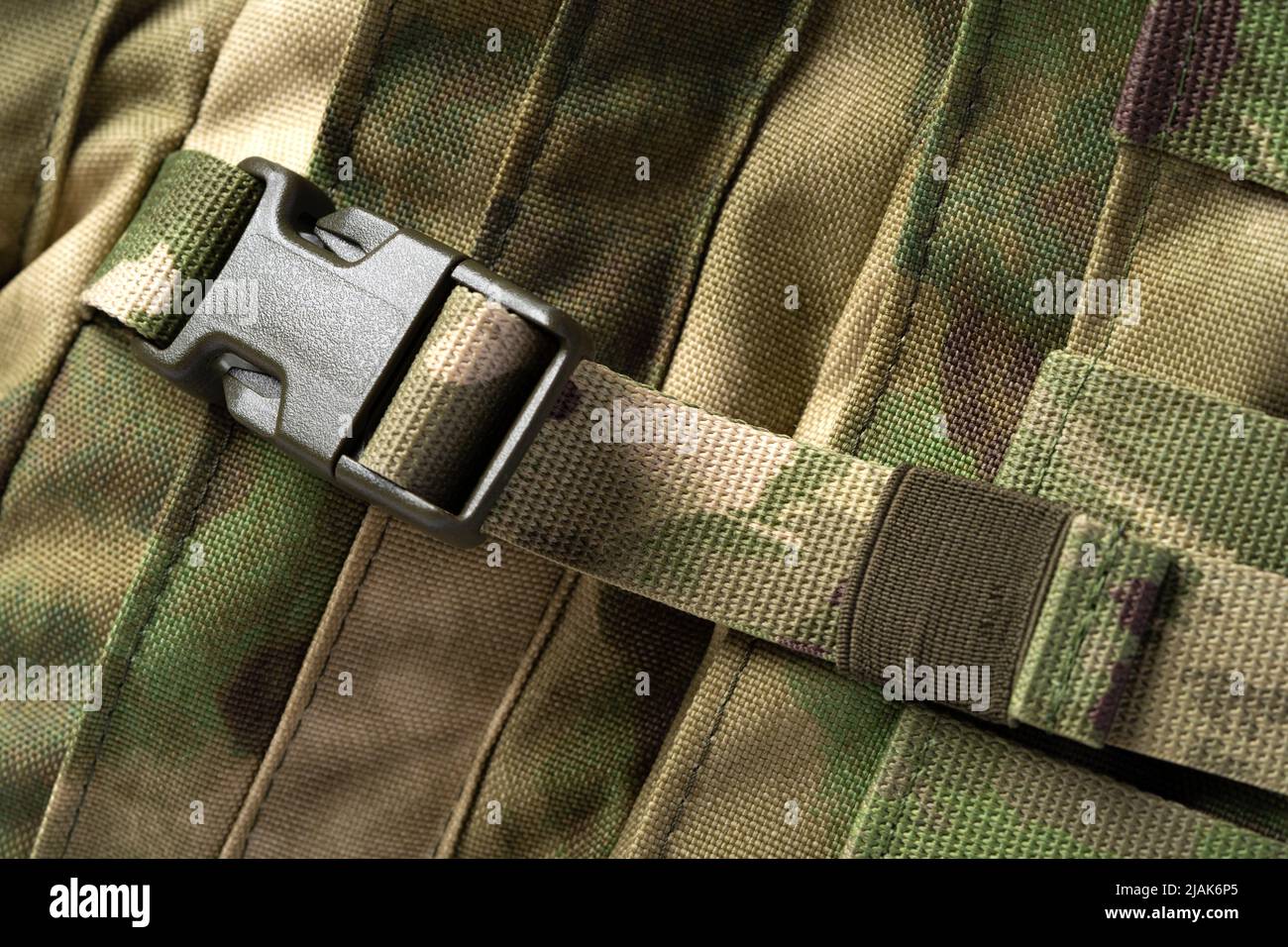 Close up still life of a green army tactical backpack Stock Photo - Alamy