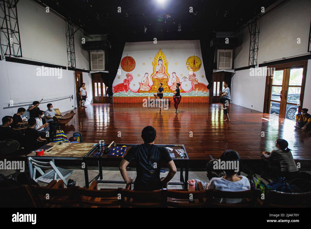 Khon performers seen practicing a dance posture for the show at Chang ...