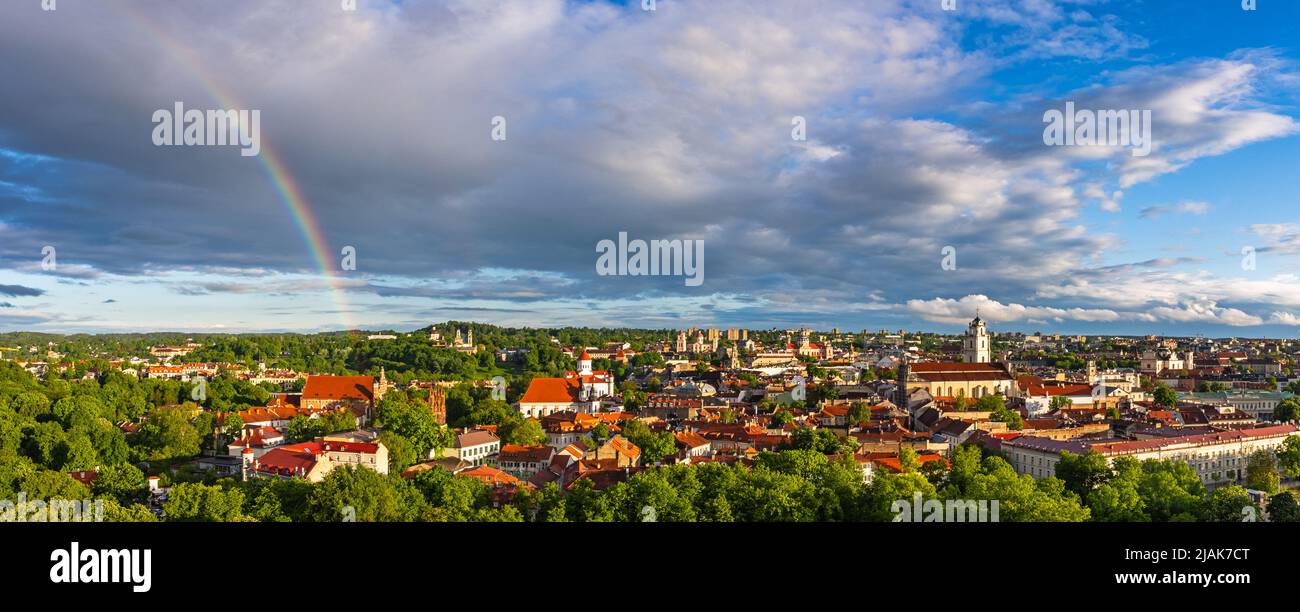 Rainbow over Vilnius old town, colorful evening view of Vilnius ...