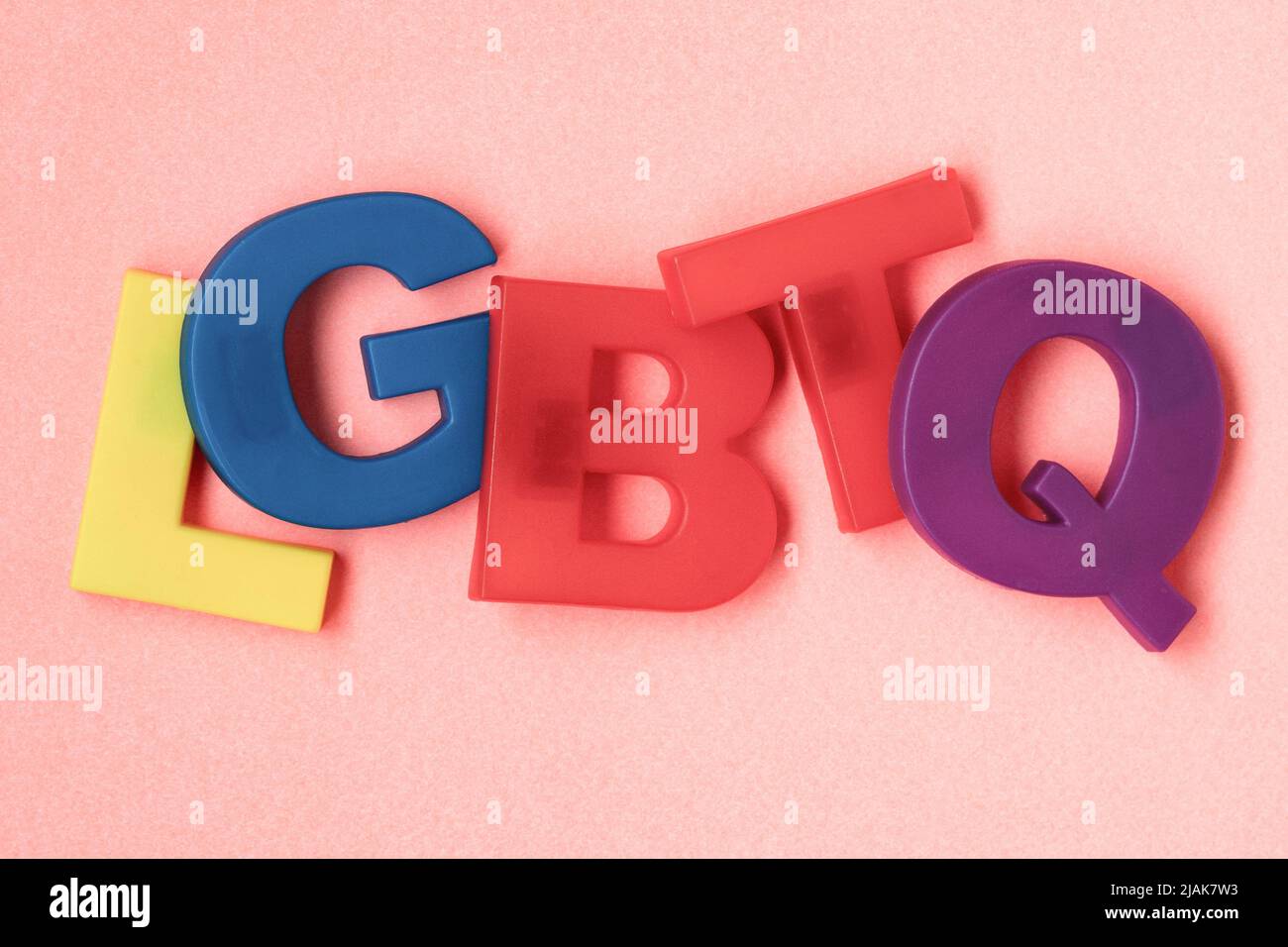 LGBTQ word made from colourful plastic fridge magnets. Concept Lgbt ...