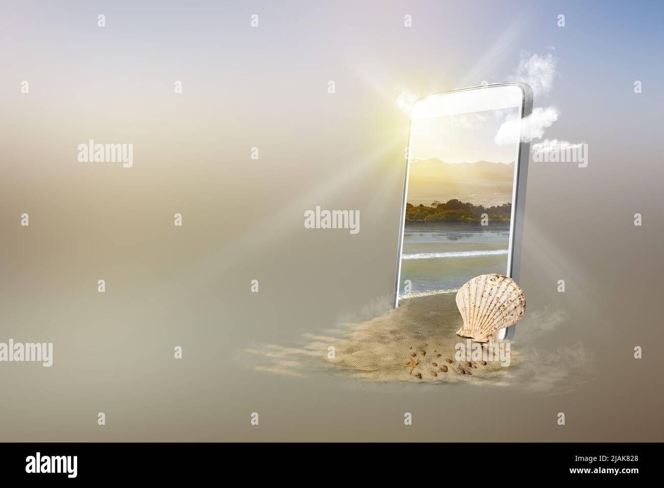 Mobile phone screen with a sandy beach with the blue ocean and sunlight ...