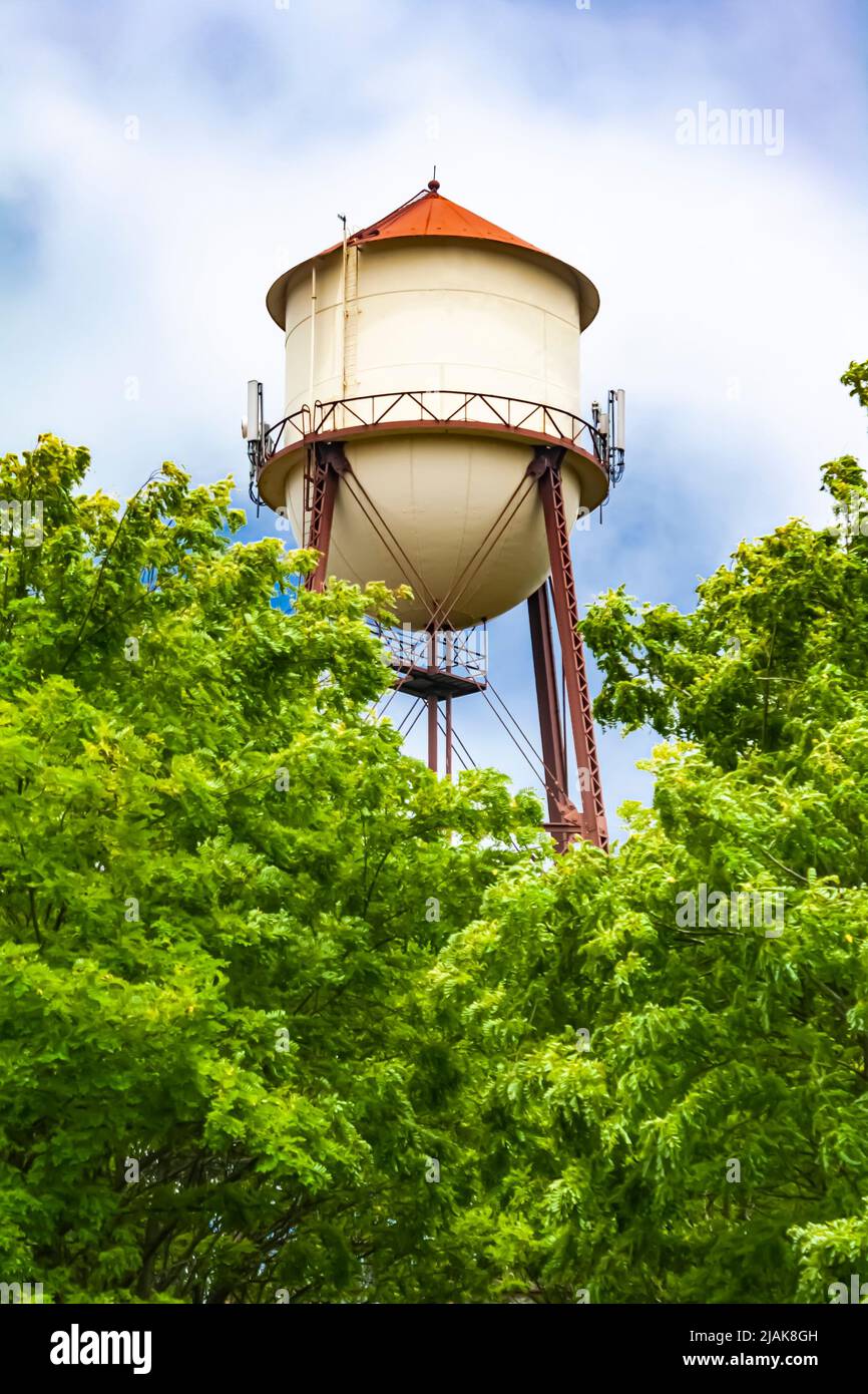 A water tower over trees Stock Photo - Alamy