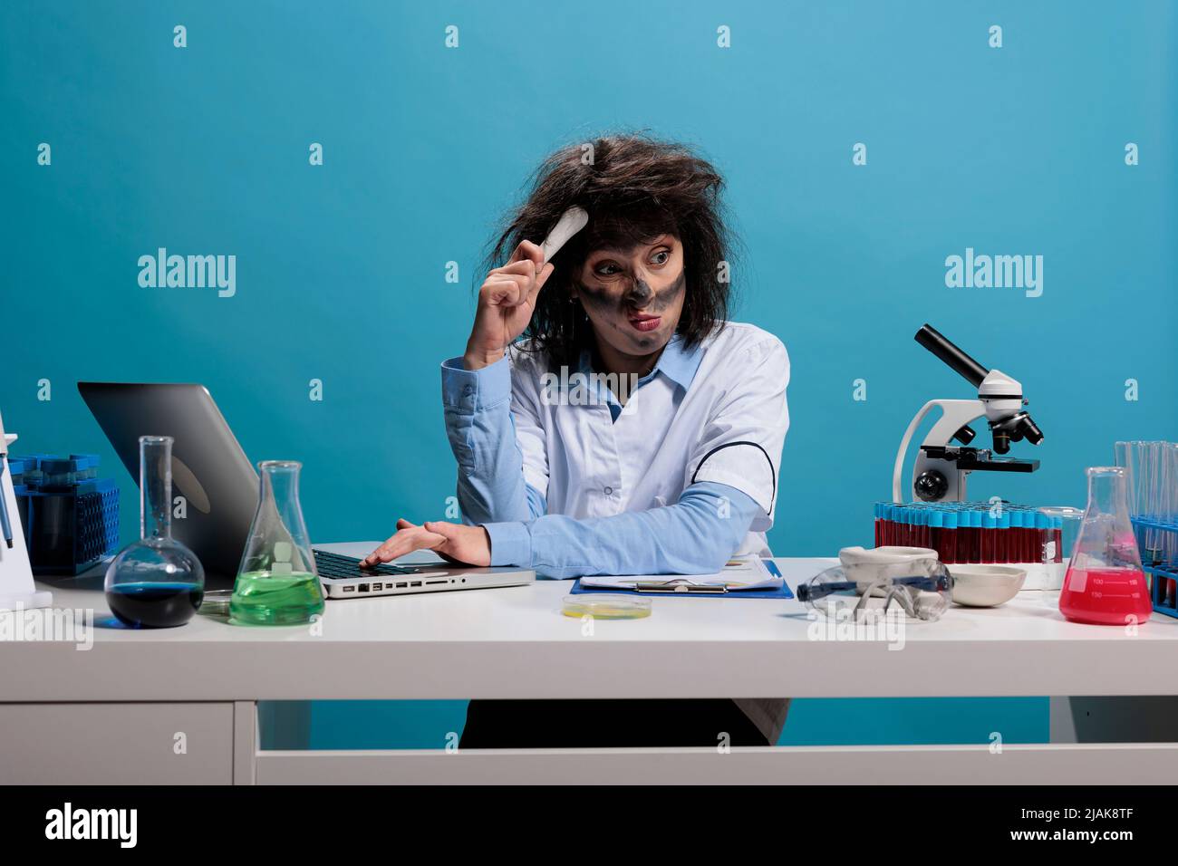 Foolish goofy biochemistry expert scratching head while trying to ...