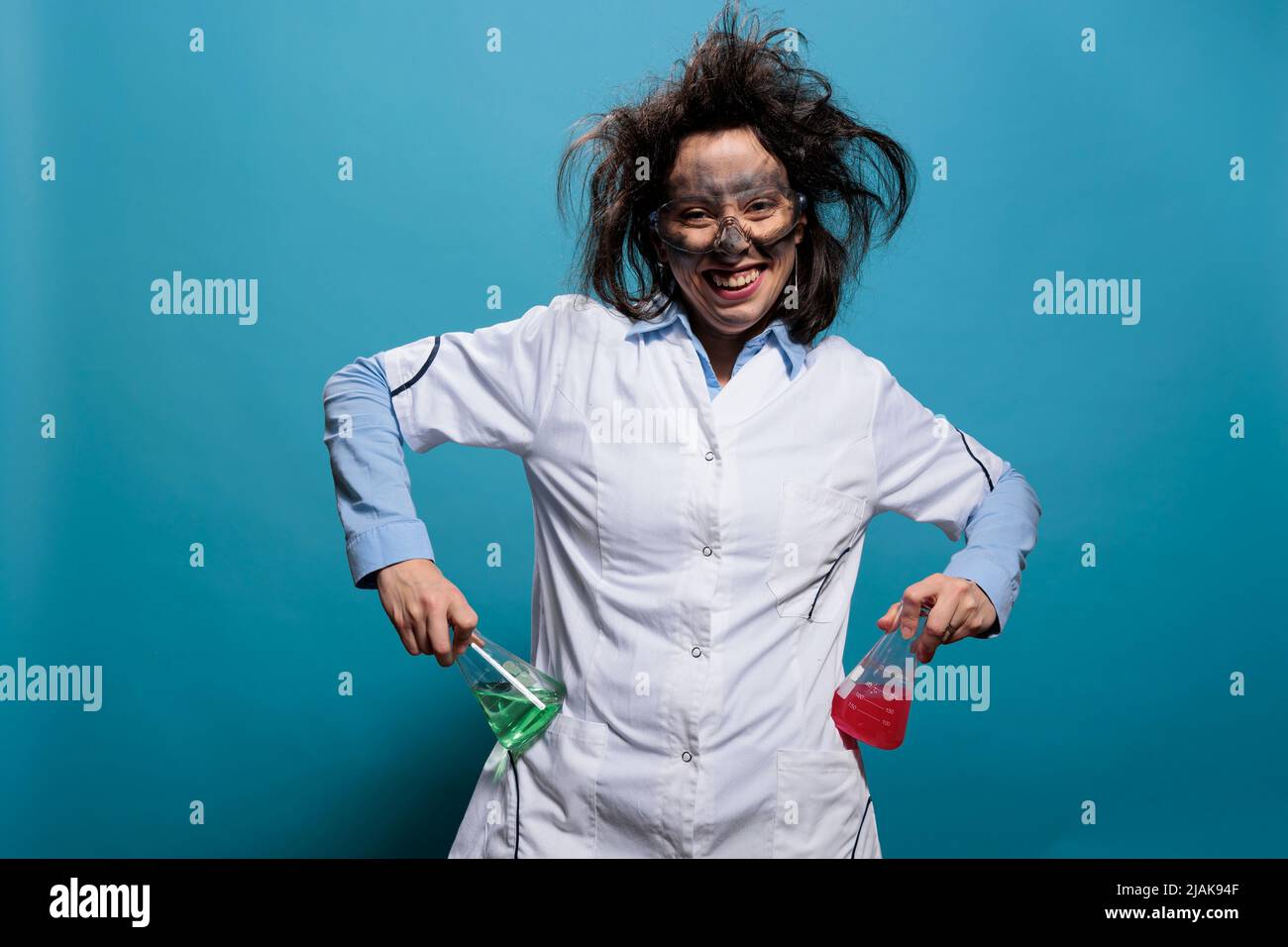 Lunatic biochemistry specialist grinning creepy while holding ...