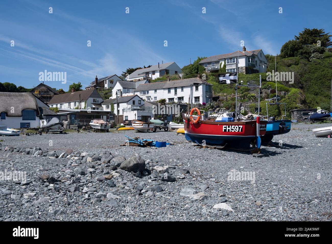The rocky beach at Porthallow, Cornwall a small fishing community on ...