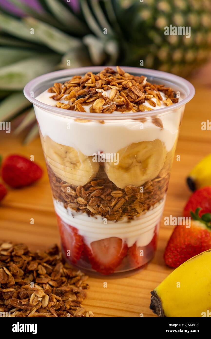 Tropical Fruits Acai Bowl with banana and Strawberry Stock Photo - Alamy