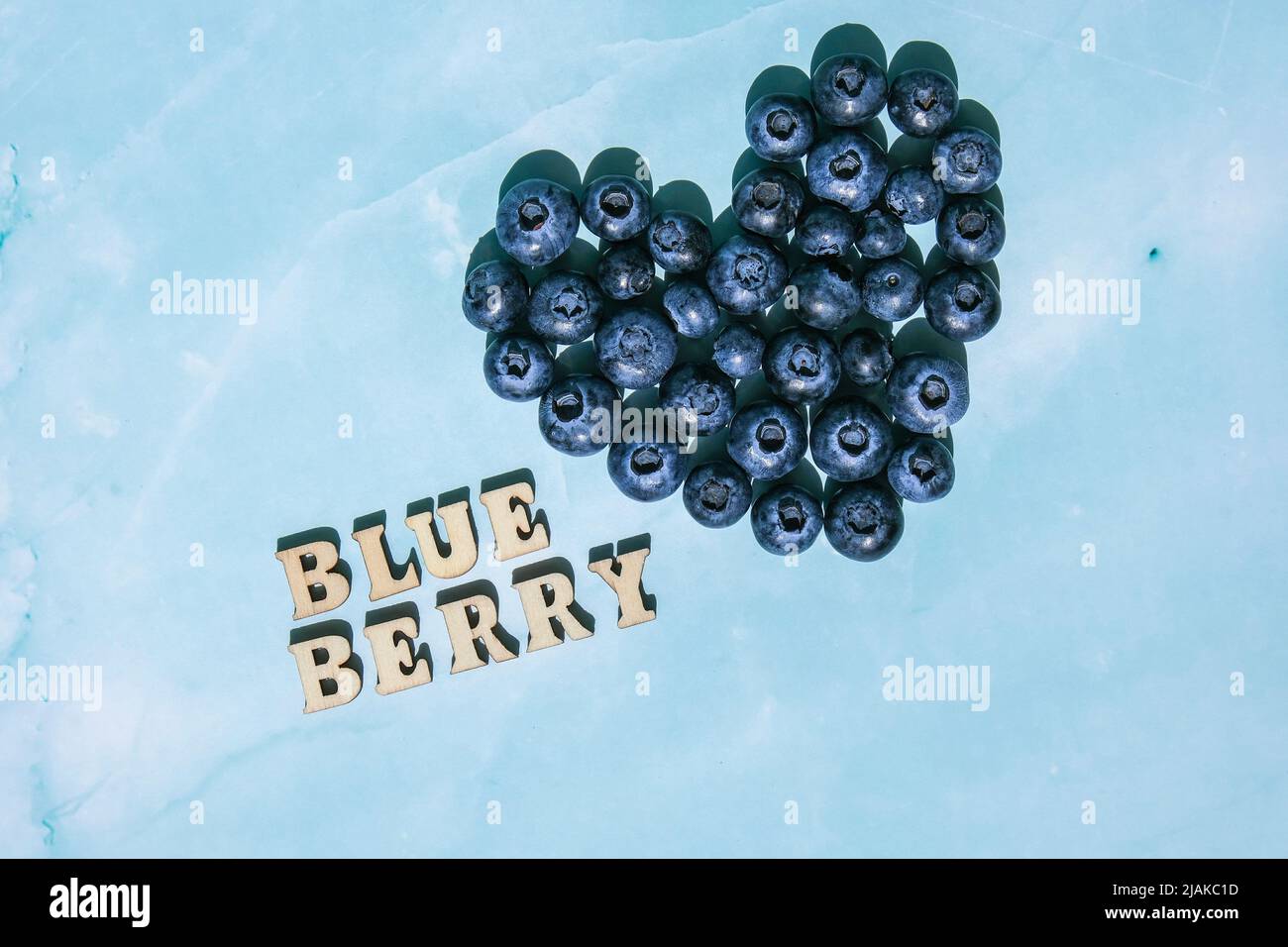 Heart made of Fresh blueberries and BLUEBERRY text. Blueberry ...