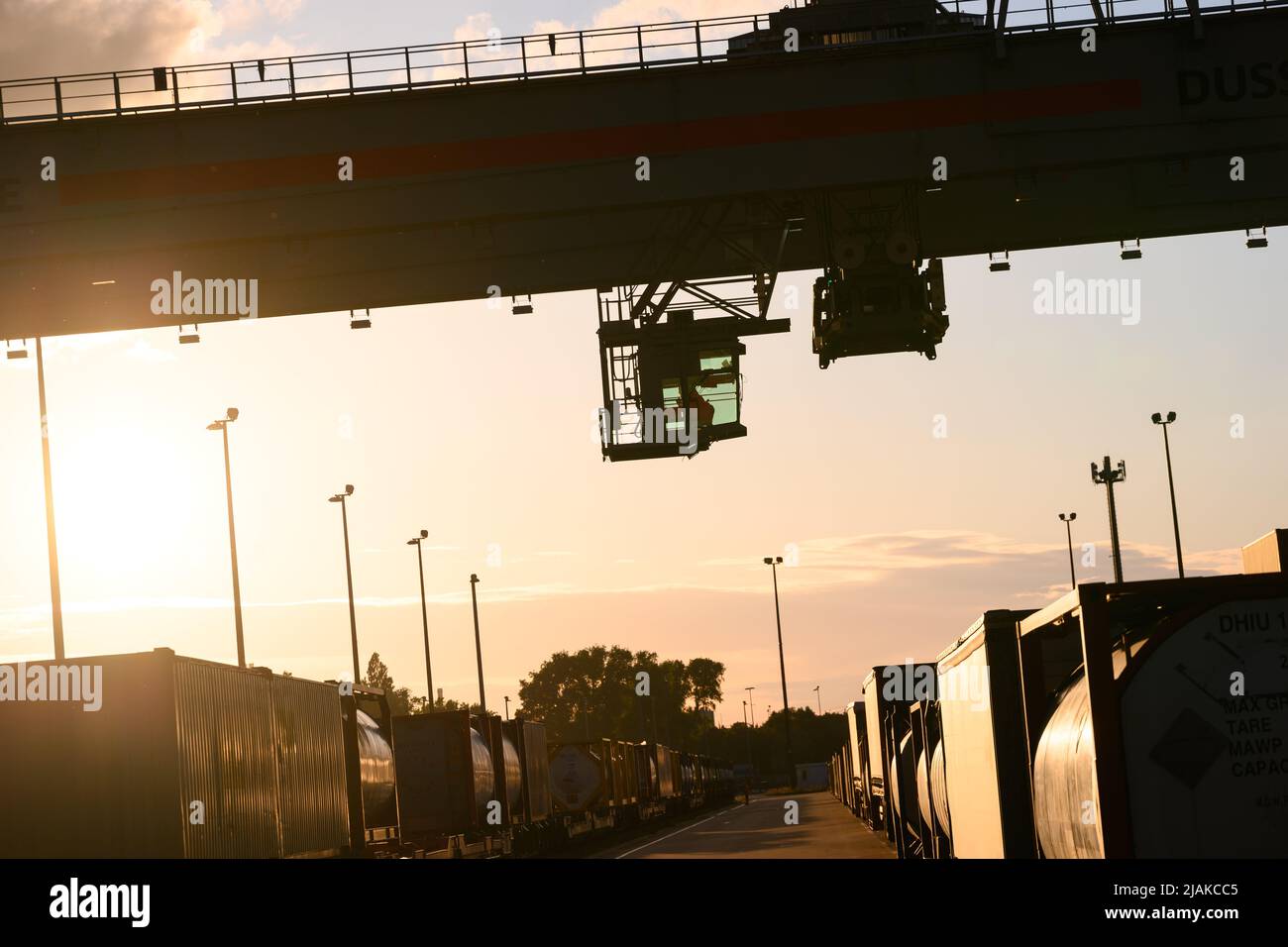 Hamburg, Germany. 30th May, 2022. A gantry crane passes over the DUSS ...